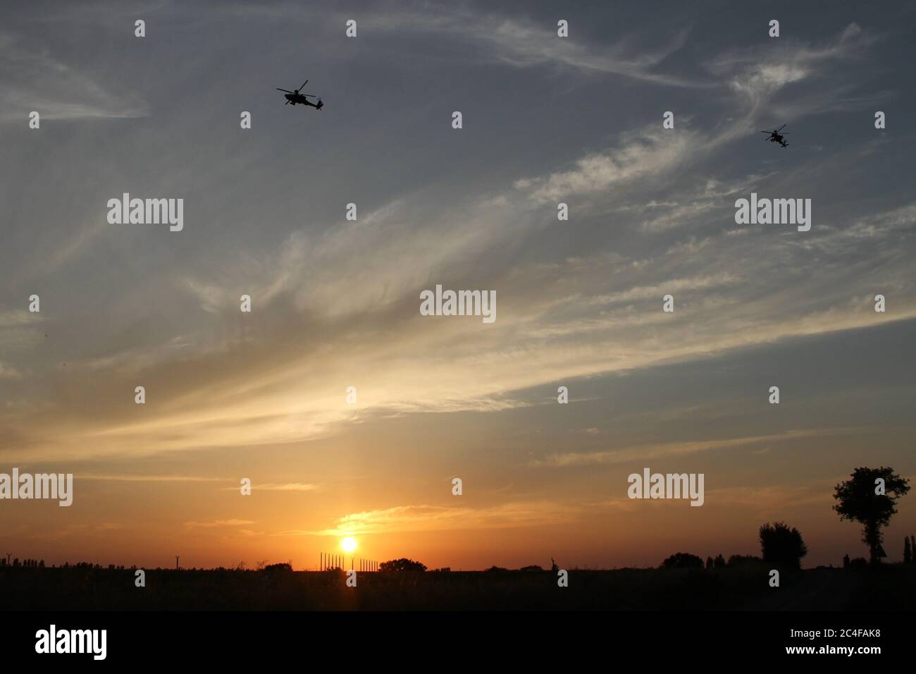 Apache helicopters flying hi-res stock photography and images - Alamy