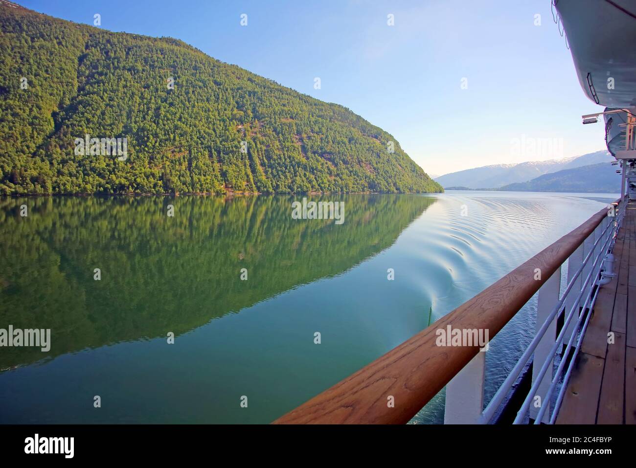 Deck of a ship as it cruises down the Sognefjord or Sognefjorden ...
