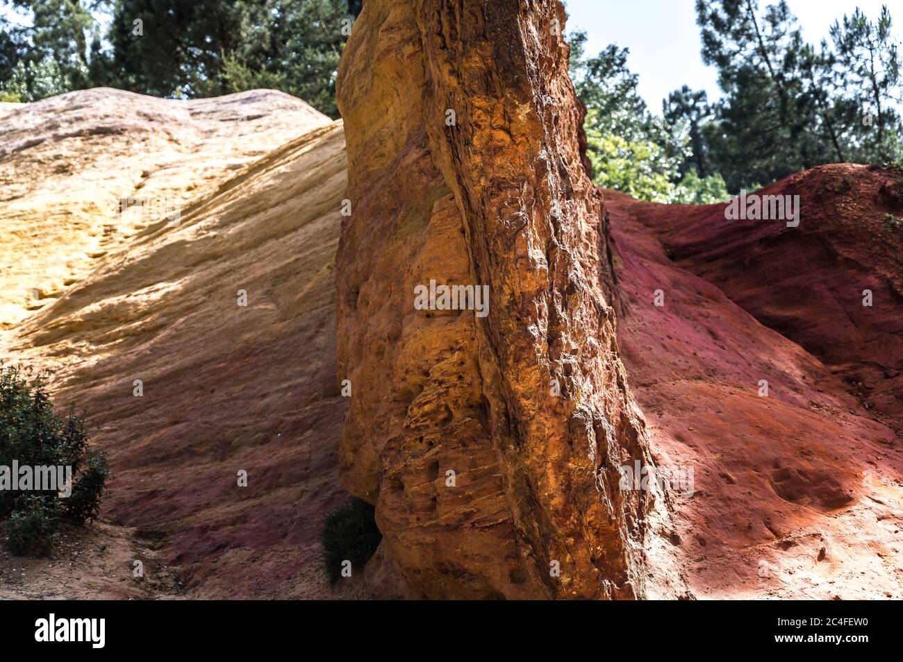 Shot of a beautiful red sharp hill in the Colorado Provence in Rustrel ...