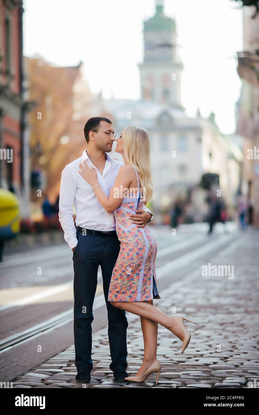 Romantic tourist couple walking around the city relaxing Stock Photo ...