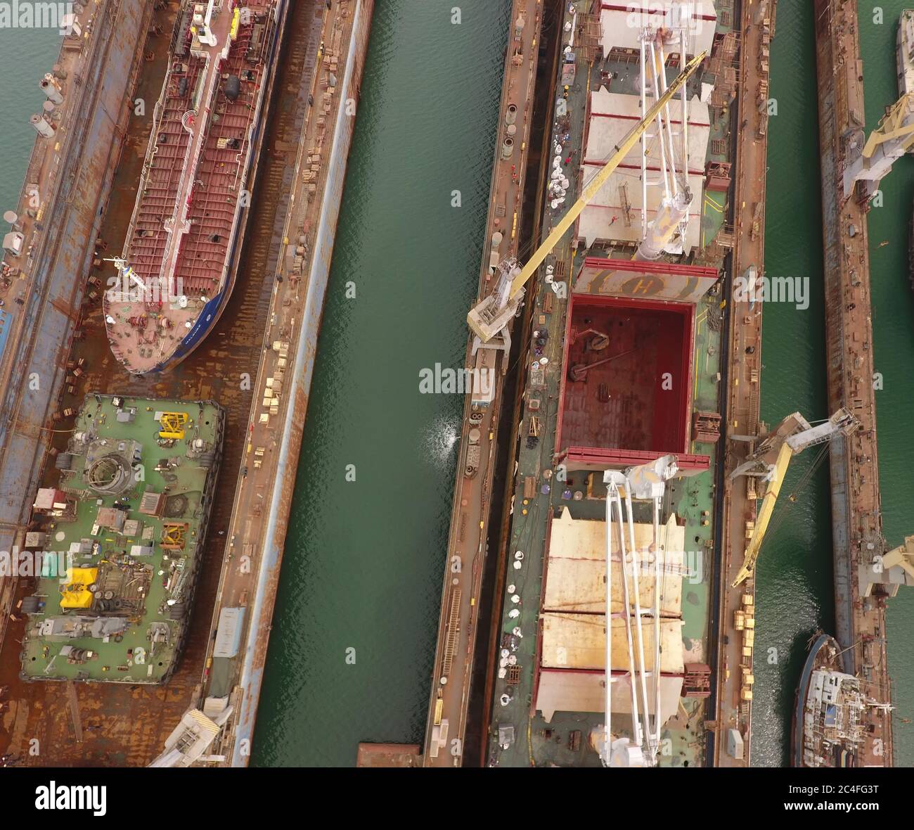 repair vessels hull (ship, tanker) in shipyard Stock Photo - Alamy