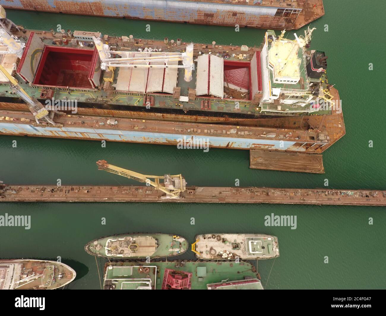 repair vessels hull (ship, tanker) in shipyard Stock Photo - Alamy