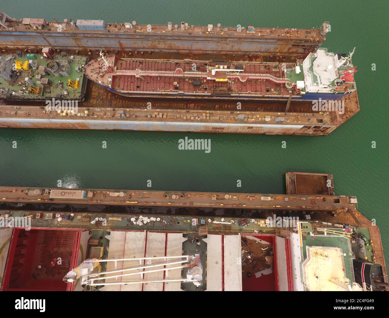 repair vessels hull (ship, tanker) in shipyard Stock Photo - Alamy