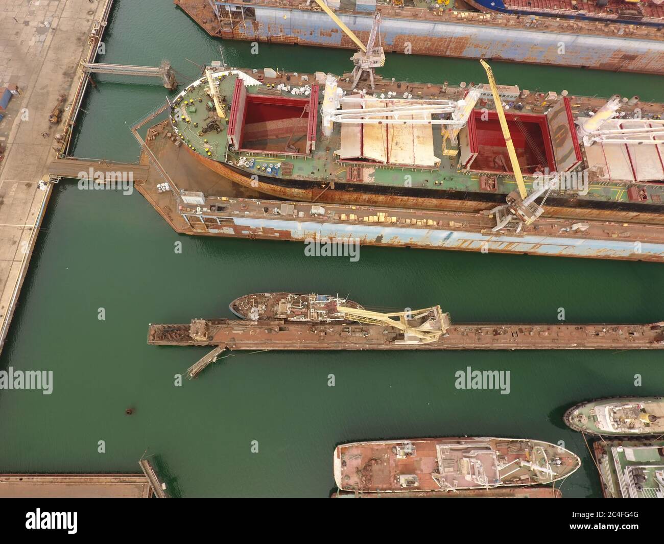 repair vessels hull (ship, tanker) in shipyard Stock Photo - Alamy