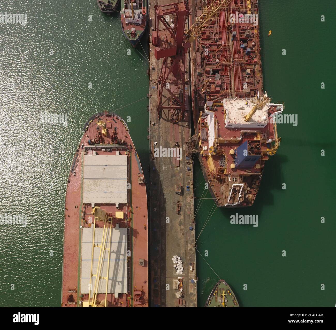 repair vessels hull (ship, tanker) in shipyard Stock Photo - Alamy