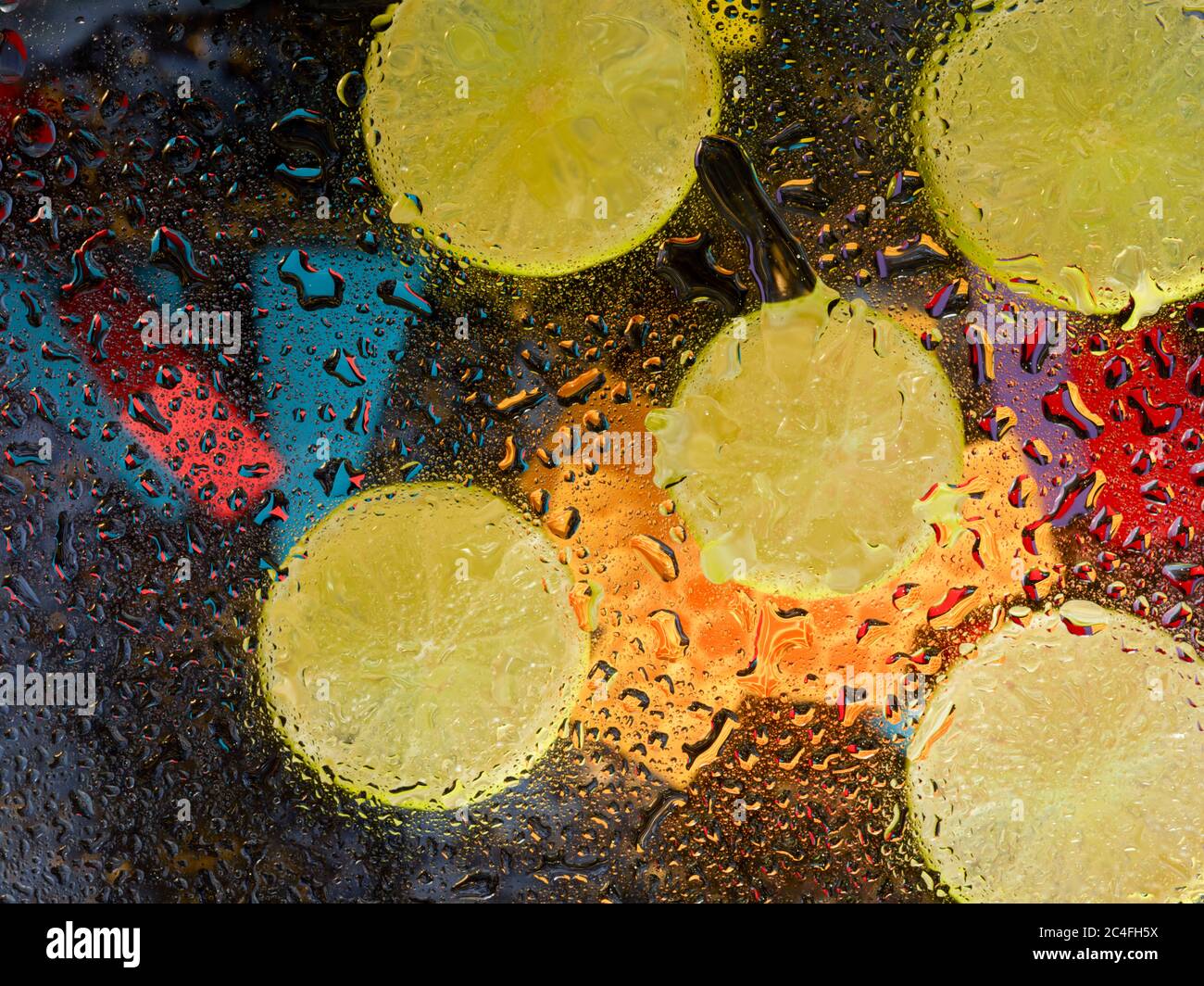 Sliced lime patterns and water droplets on a hard surface Stock Photo ...