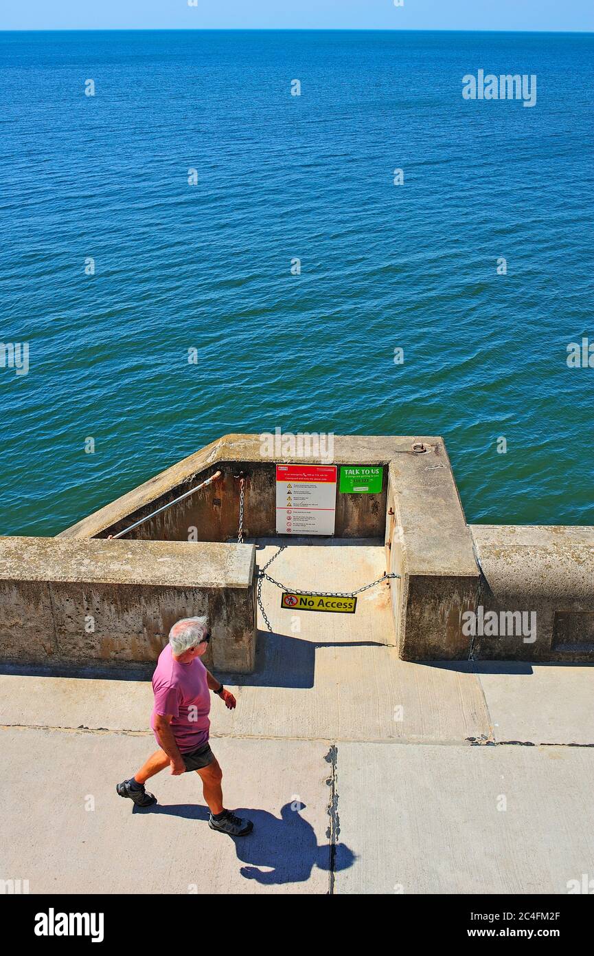 Chained Man Walking High Resolution Stock Photography and Images - Alamy