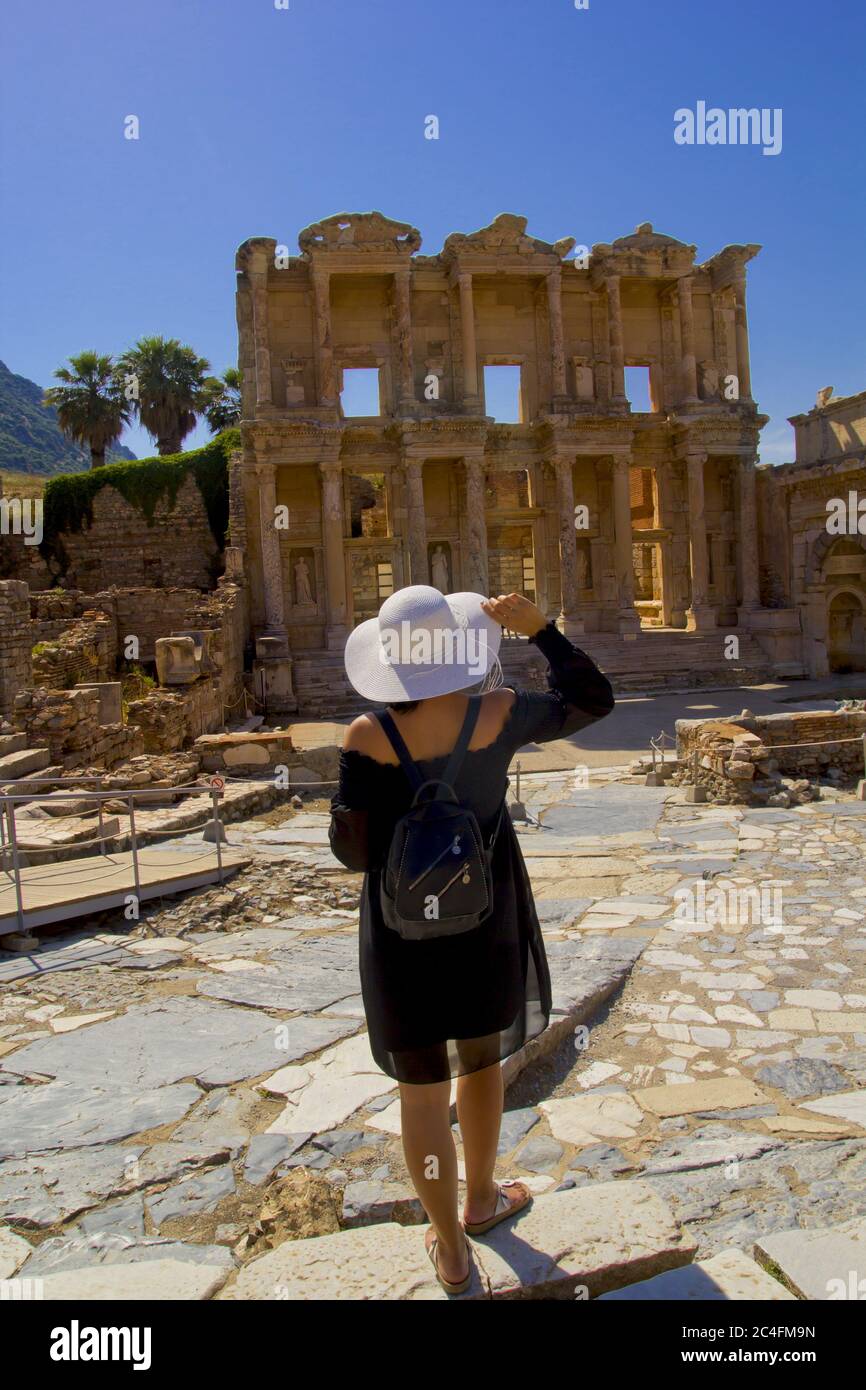Beautiful young woman in black dress in Ephesus ancient city Stock ...