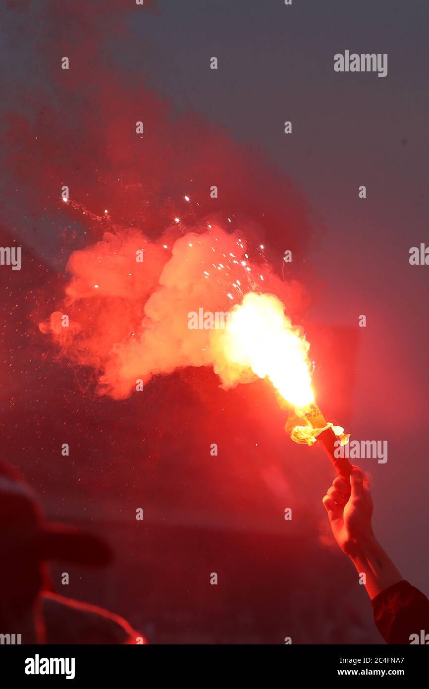 Liverpool fans let off flares outside the Liver Building in Liverpool ...