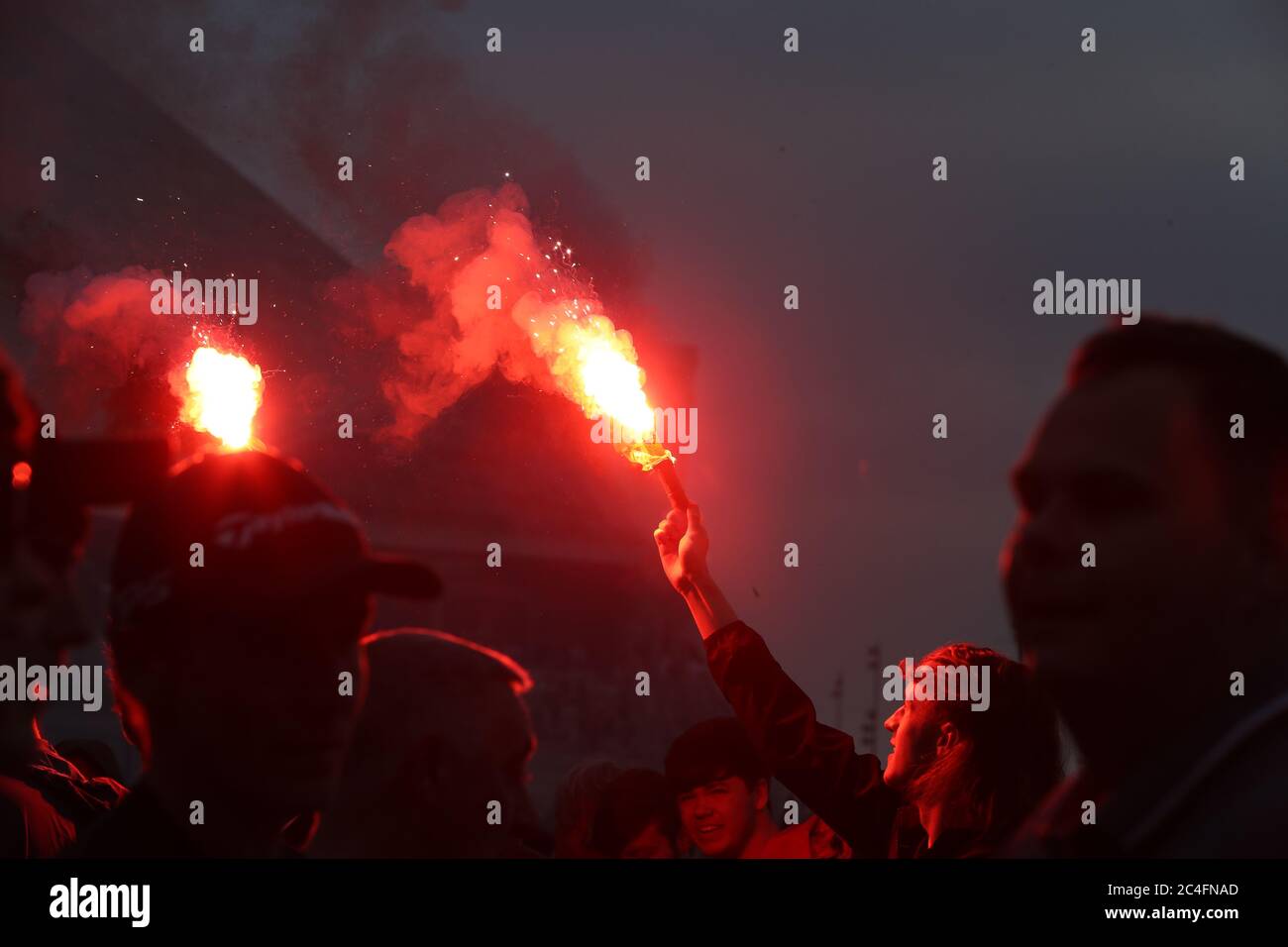 Liverpool fans let off flares outside the Liver Building in Liverpool ...