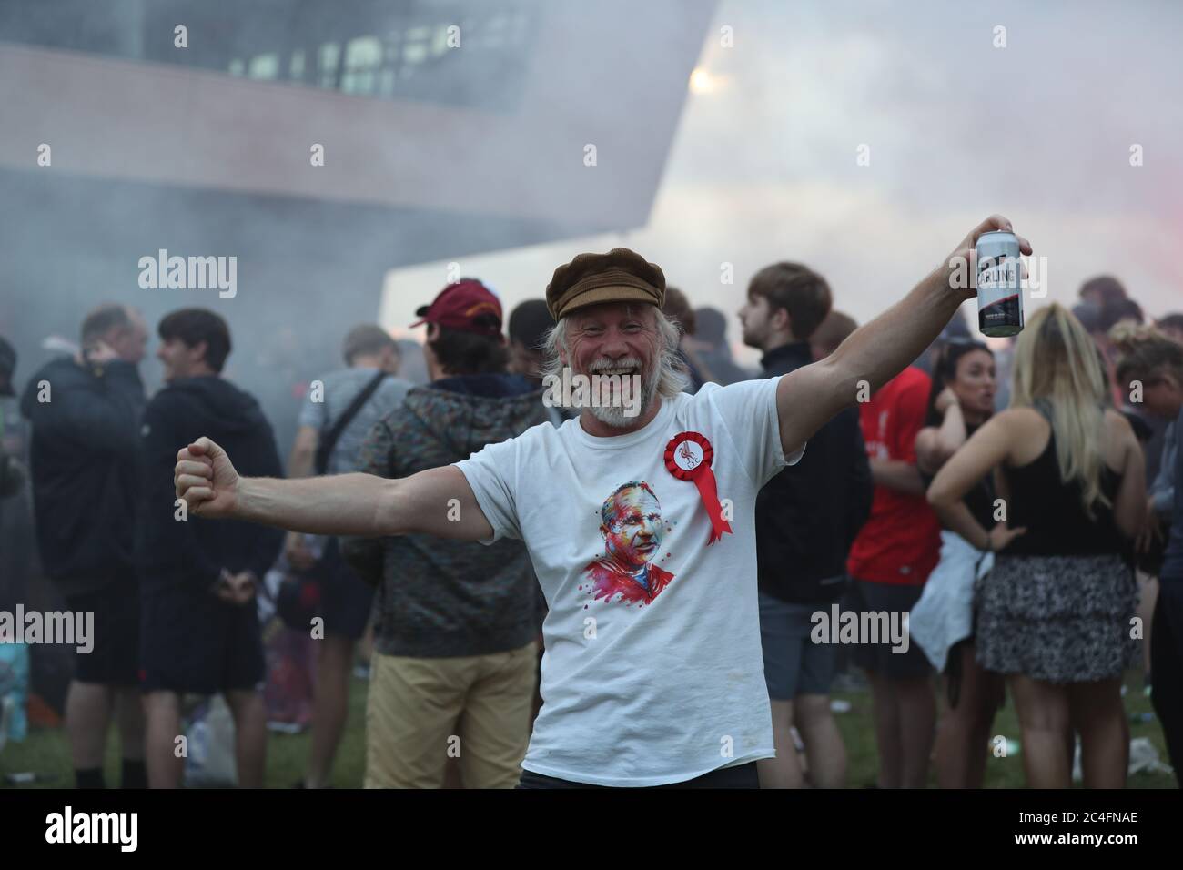 Liverpool fans let off flares outside the Liver Building in Liverpool ...