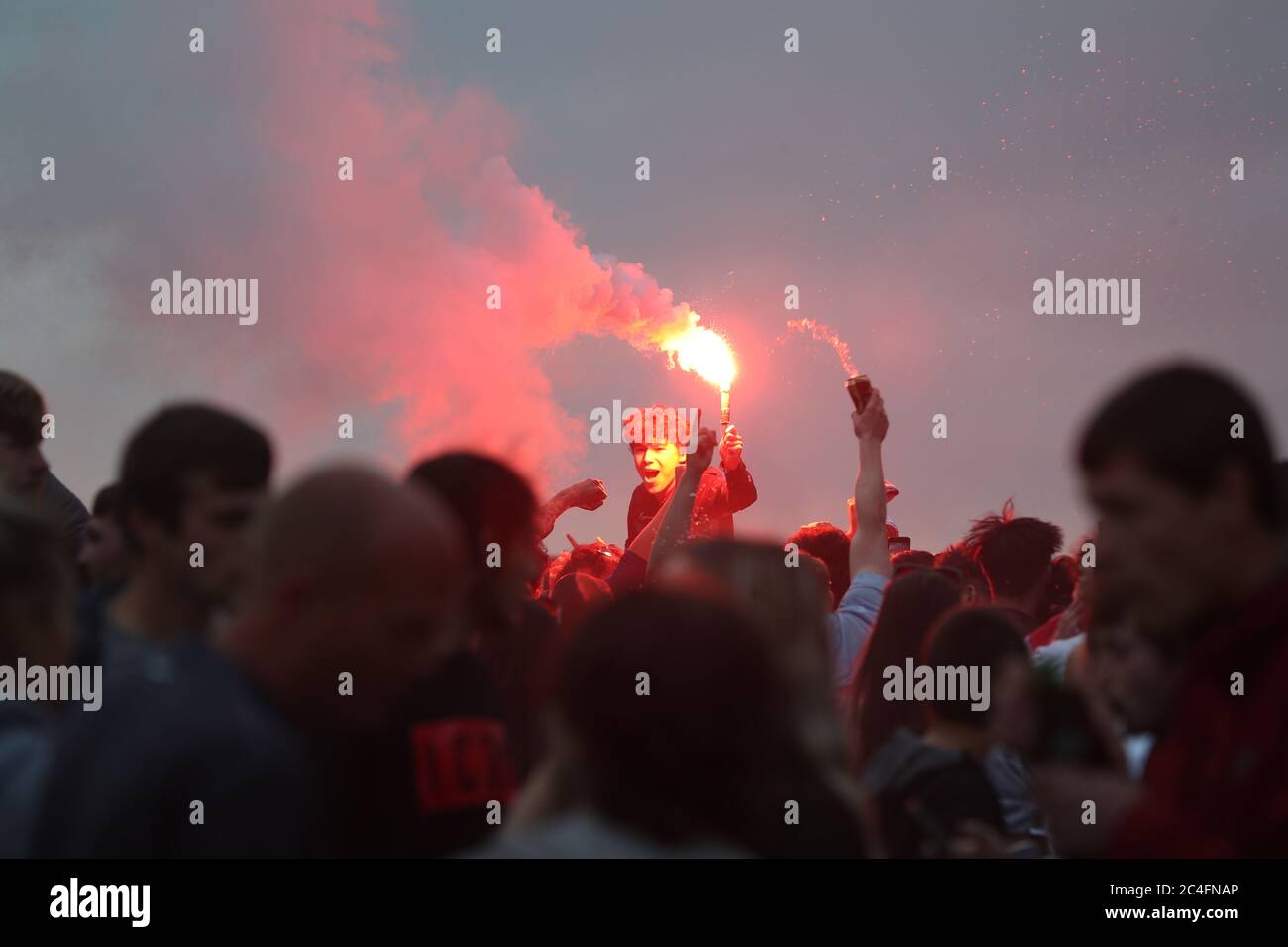 Liverpool fans let off flares outside the Liver Building in Liverpool ...