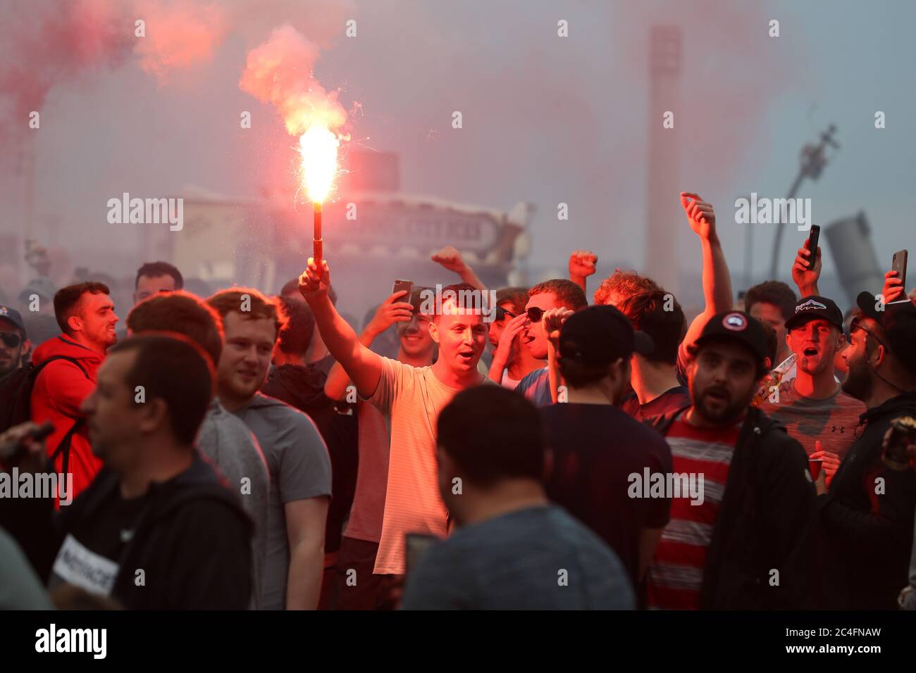 Liverpool fans let off flares outside the Liver Building in Liverpool ...