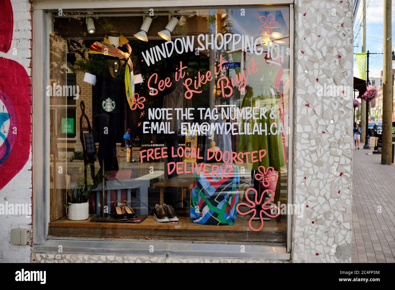 Shop window inviting people to select items by number, email and ...