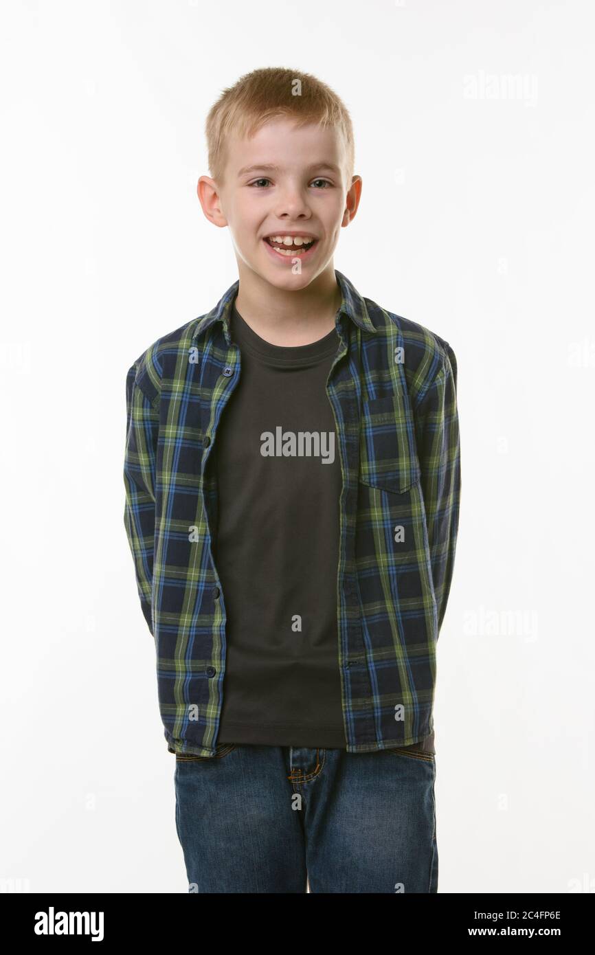 Portrait of a cheerful young man of eleven years on a white background ...
