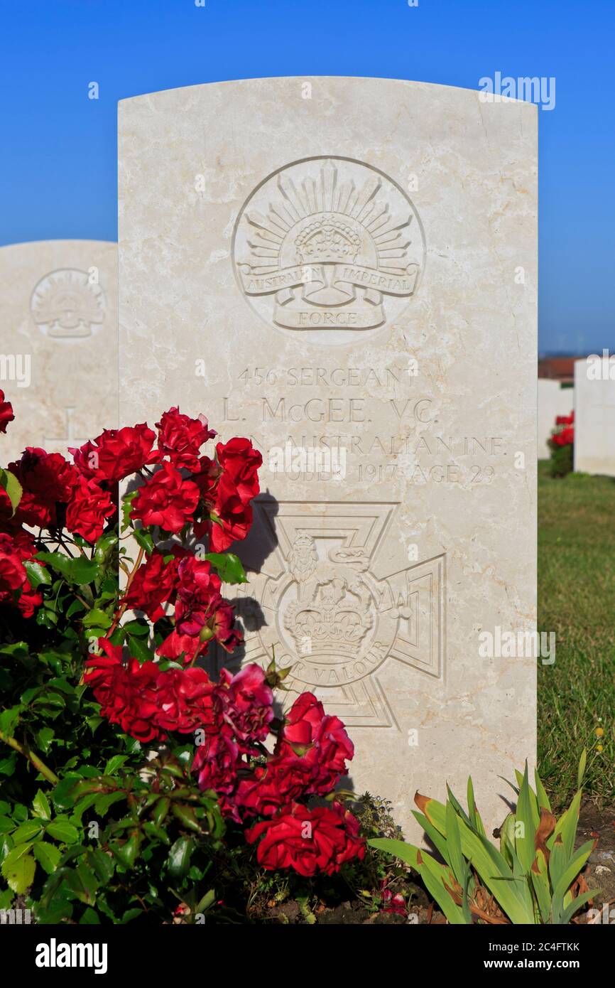 Grave of the Australian Victoria Cross recipient sergeant Lewis McGee (1888-1917) at Tyne Cot ...