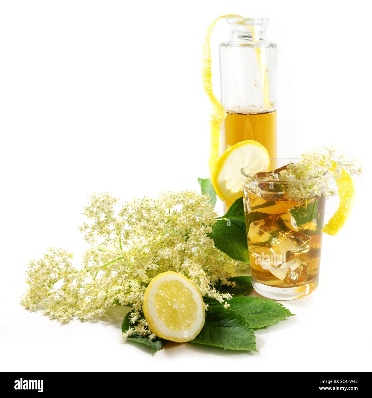 Homemade elderberry flower syrup in a bottle and lemonade drink in a ...