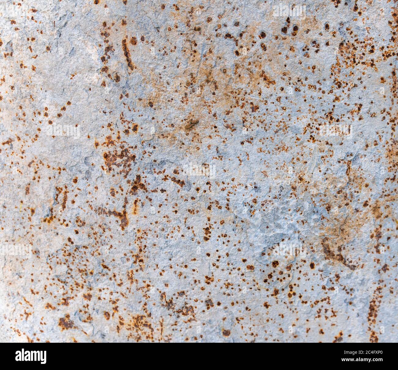 Rusted on surface of the old iron plate with cement. Deterioration of ...