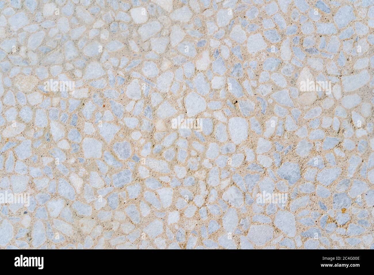 Decorative polished beige concrete tile on the facade of the building ...