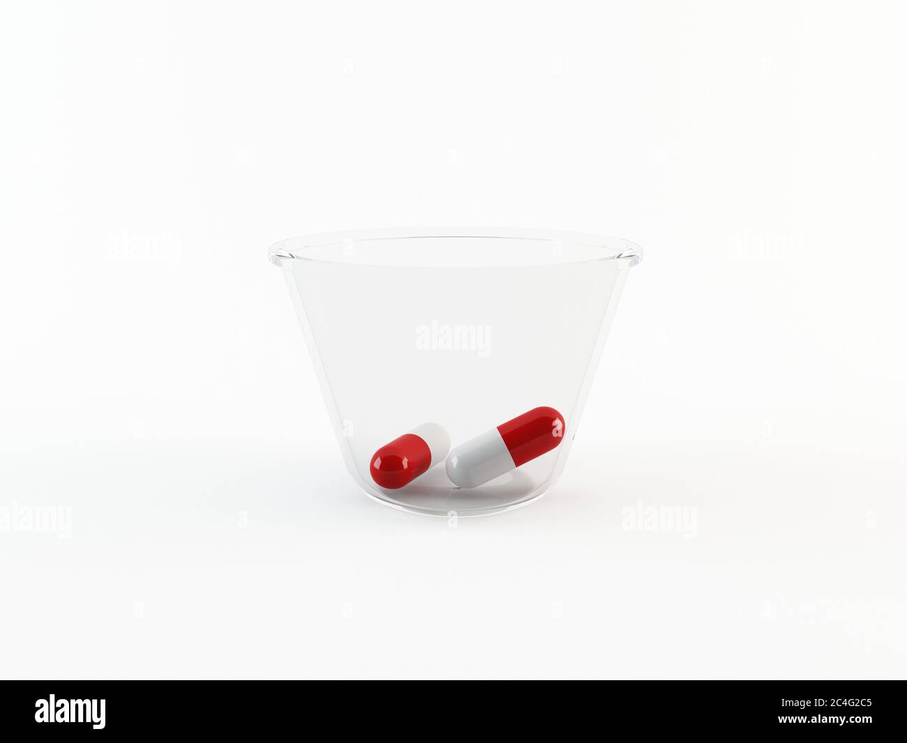 Medicine. 2 pills in a cup Stock Photo - Alamy