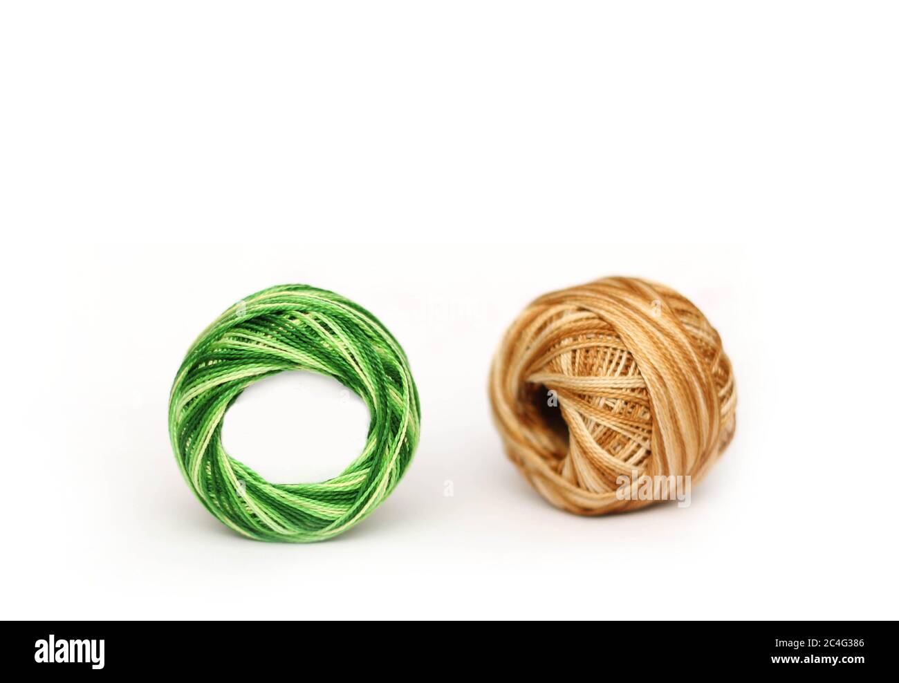 Colorful embroidery threads isolated on white background Stock Photo ...