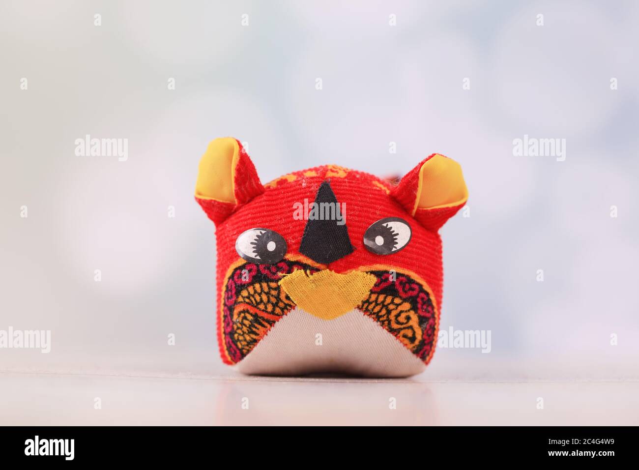 traditional hand made cloth tiger toy Stock Photo - Alamy
