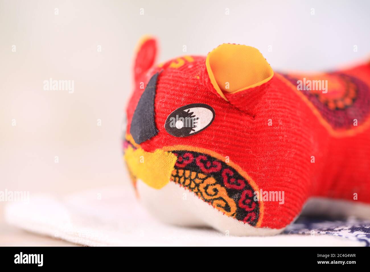 traditional hand made cloth tiger toy Stock Photo - Alamy