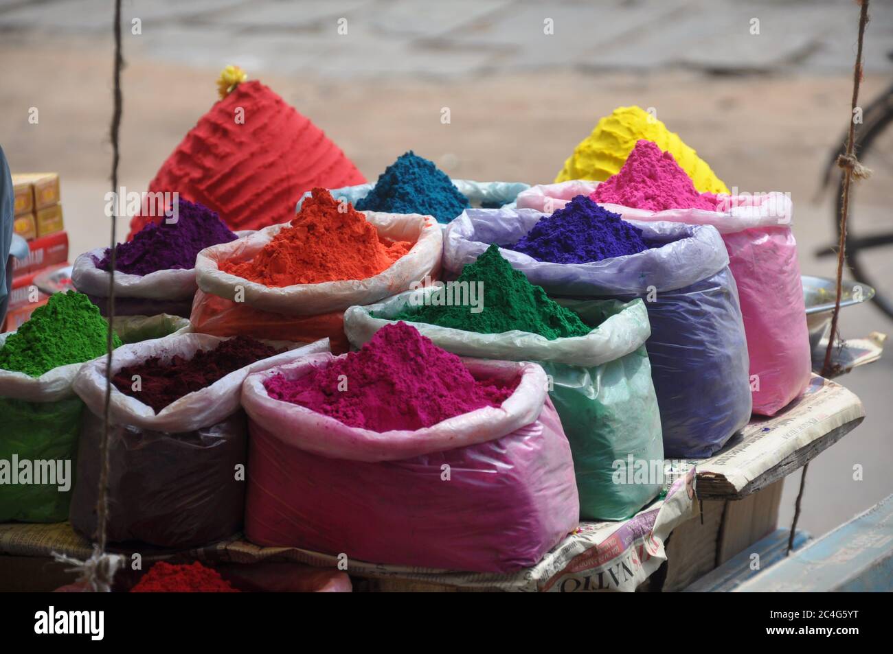 Bags of indian coloured powder for festivals at an Indian street market ...