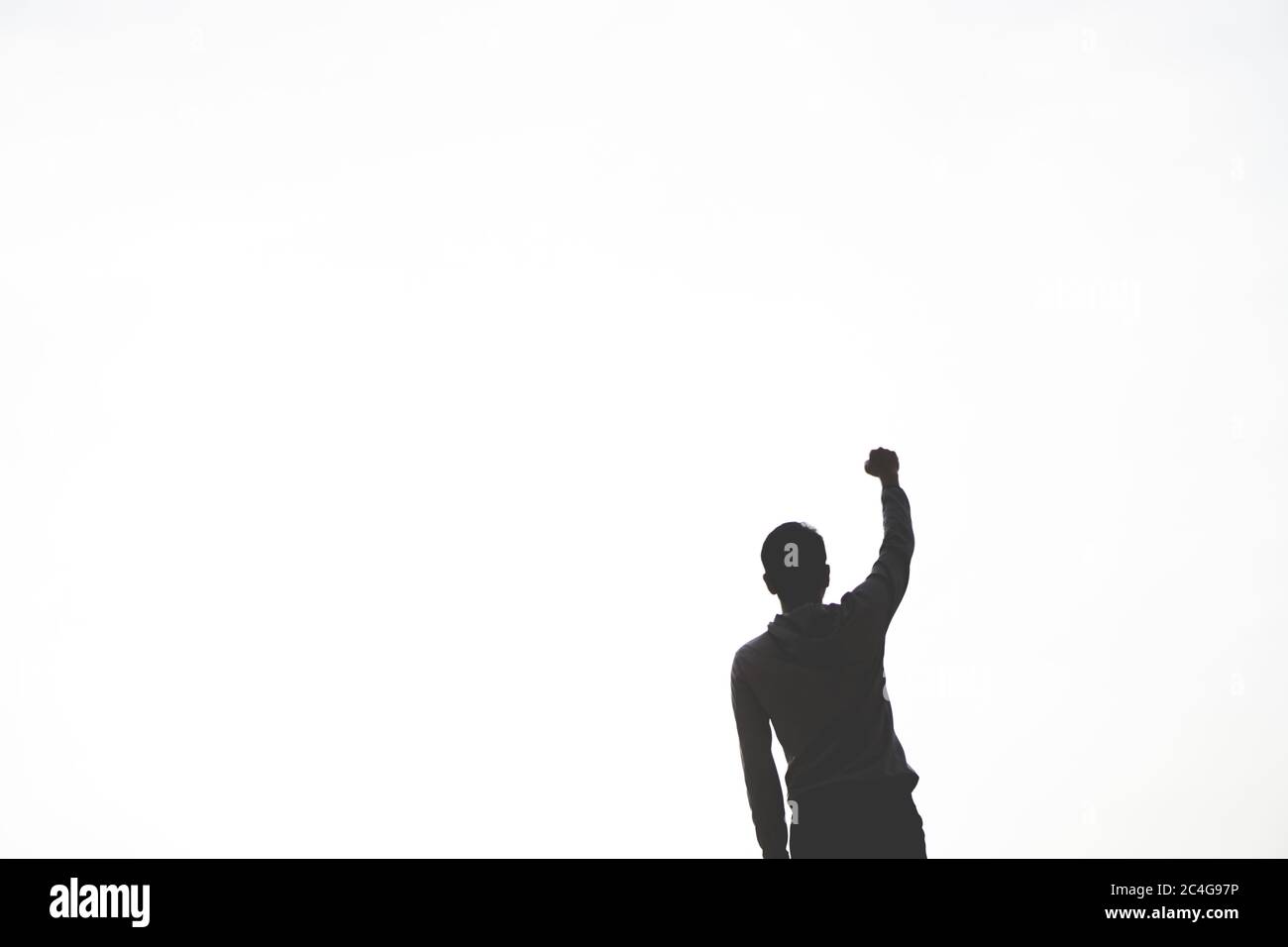 Man rise hands up to sky freedom concept with sunset sky metaphor fight ...