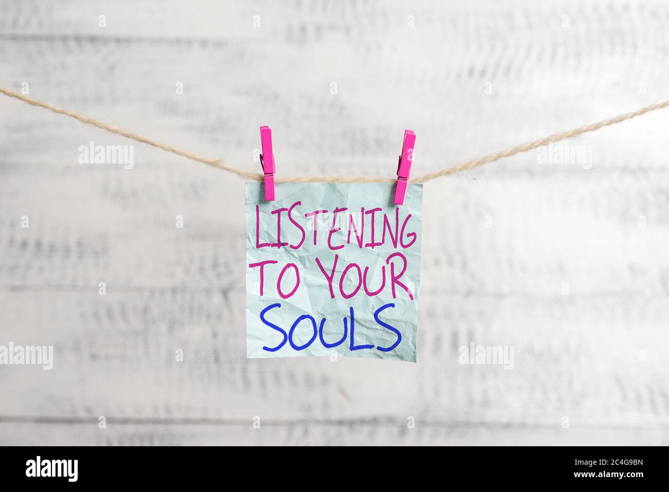 Writing note showing Listening To Your Souls. Business concept for ...