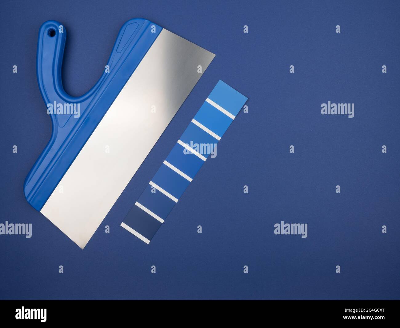 Blue construction tools on a blue background with a blue palette of ...