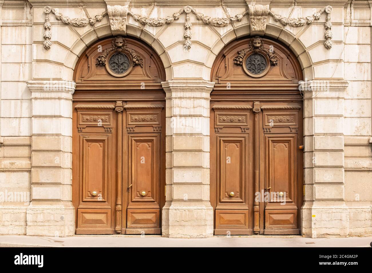 Lyon, two old wooden doors, typical building in the south of France ...