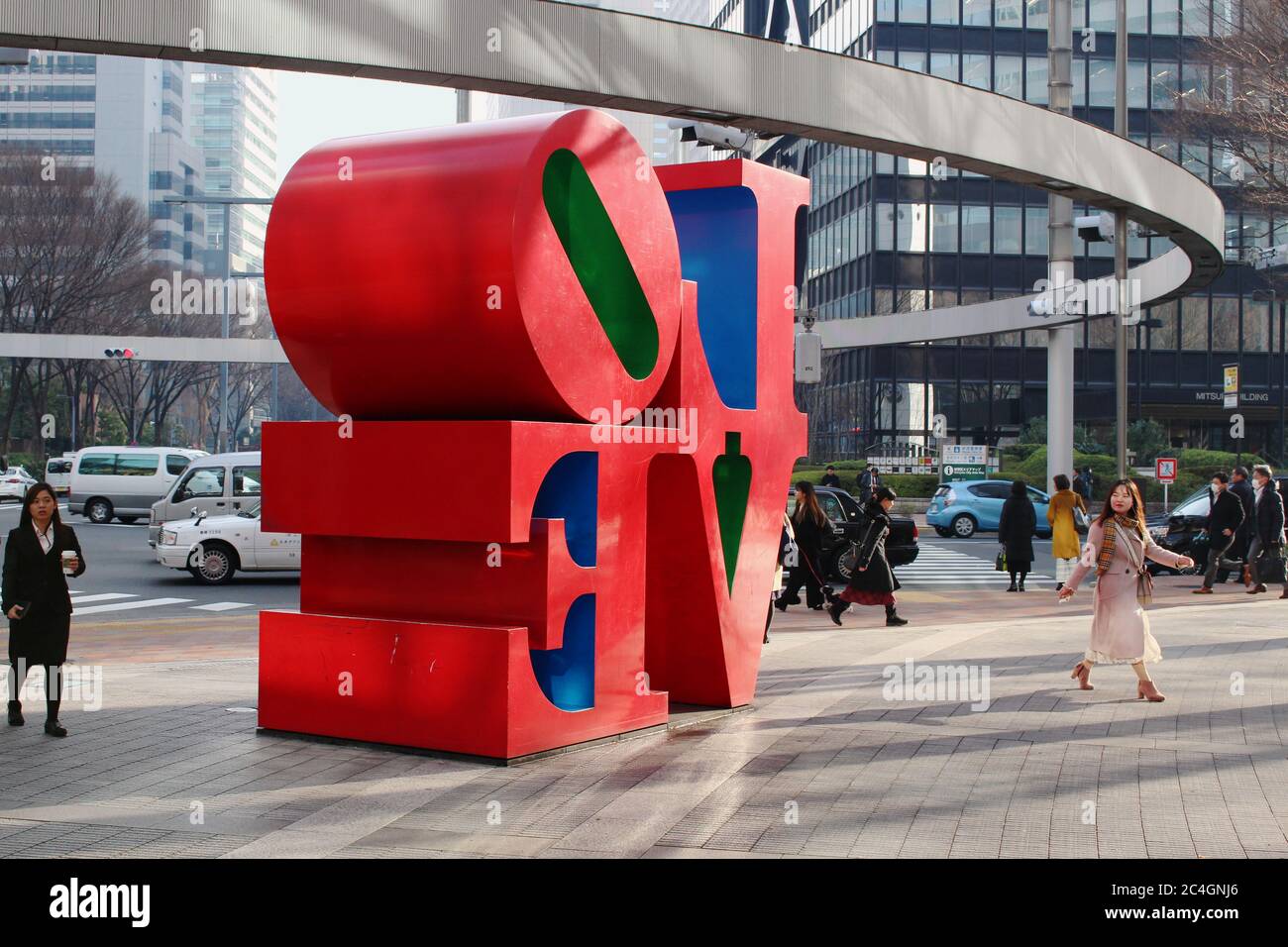 Street in Tokyo's Shinjuku area with a Robert Indiana 'Love' sculpture ...