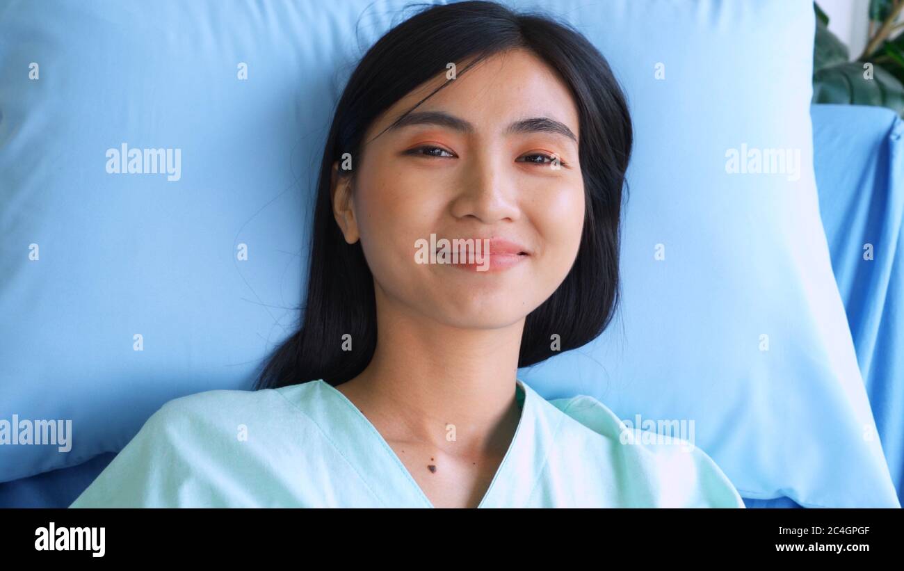 Happy patient getting well improvement at hospital ward . Health care ...