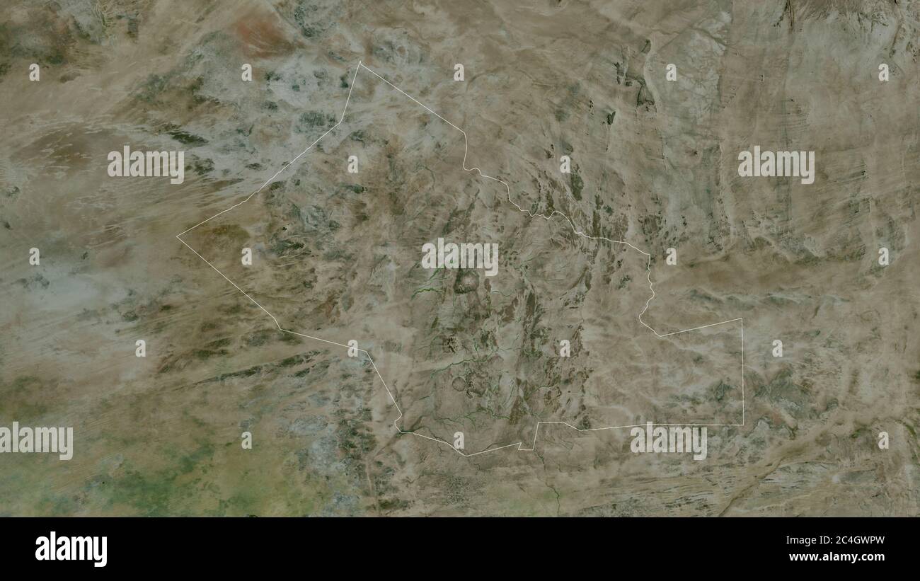 Kidal, region of Mali. Satellite imagery. Shape outlined against its ...
