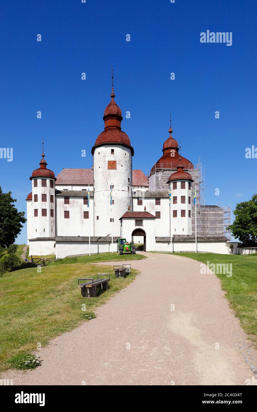 The walkway leads to the medieval Lacko Castle's main gate located in ...