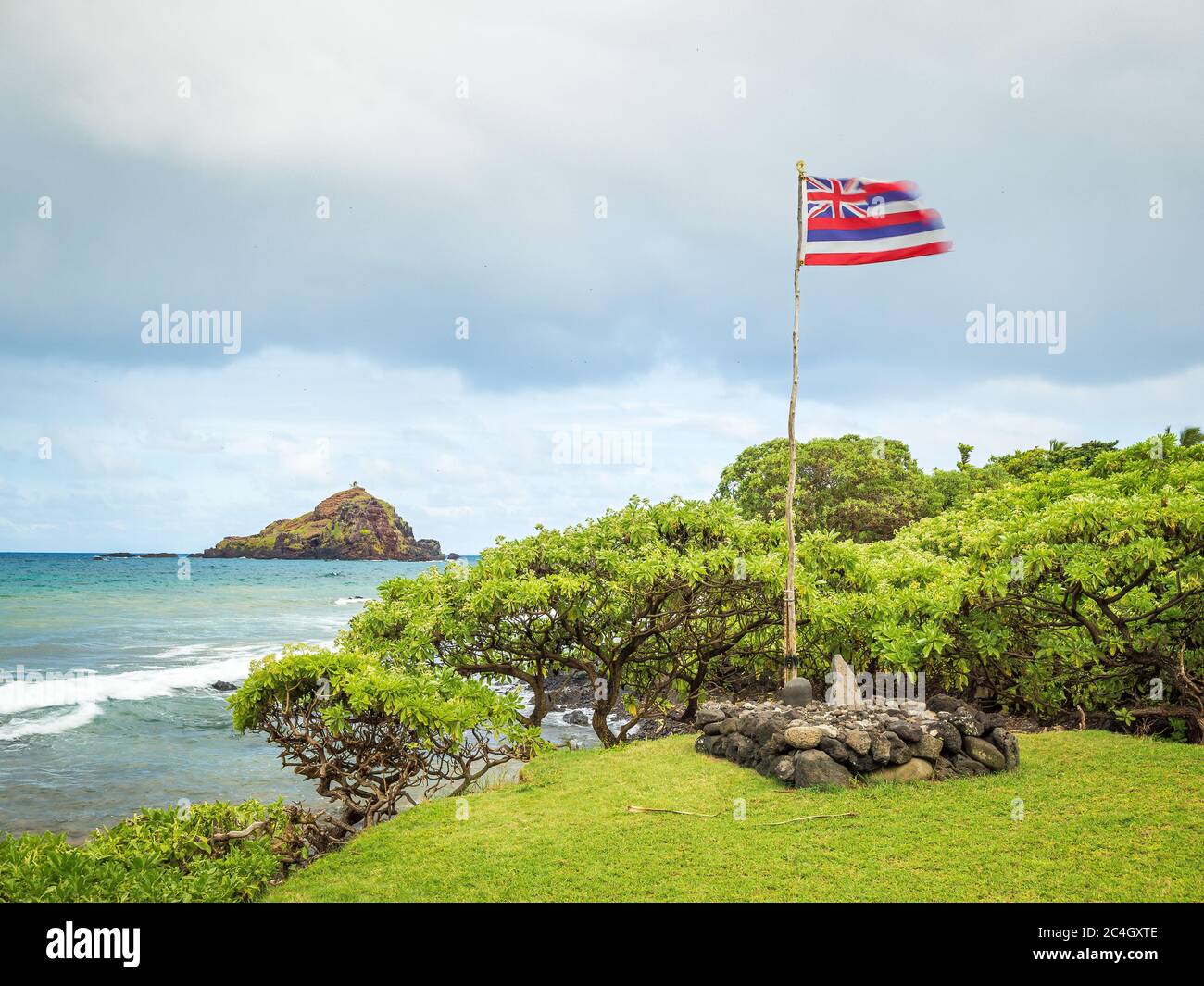 Koki Beach Park, Maui. The dark red sand at Koki Beach produced by Ka ...