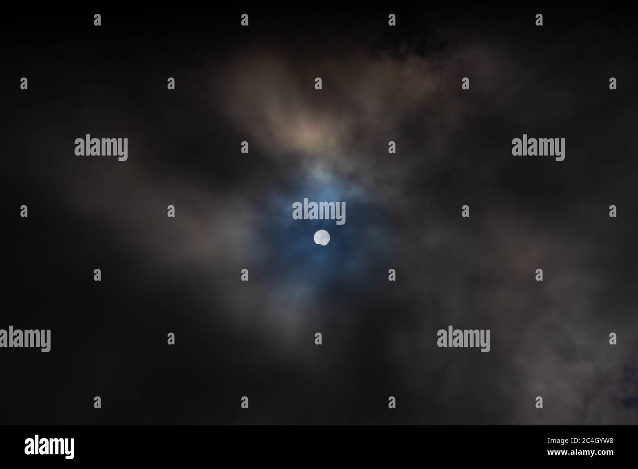 Solar eclipse in Georgia, Europe on 21st of June 2020 in clouds Stock ...