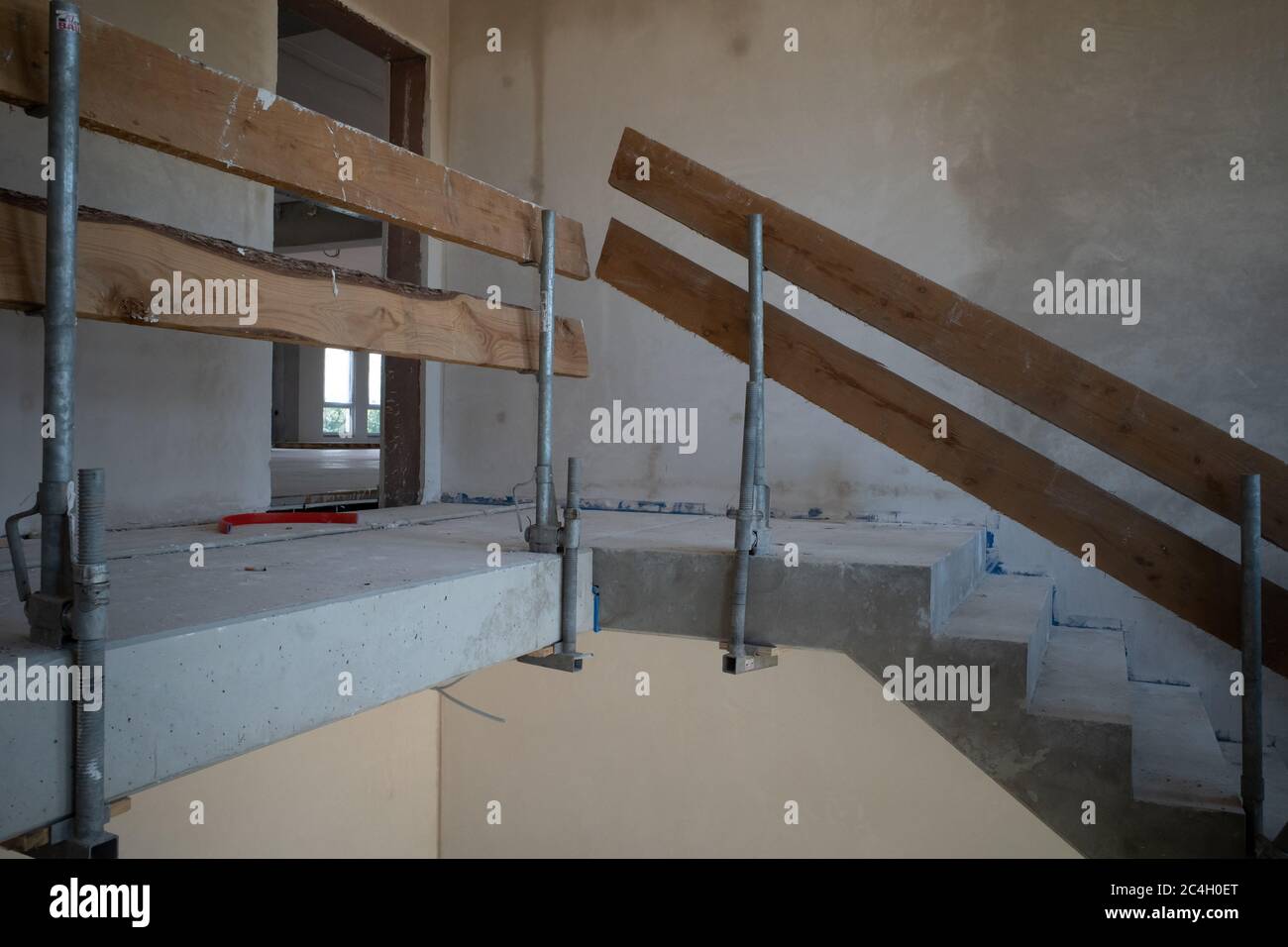 a temporary stair railing is built on a construction site Stock Photo ...
