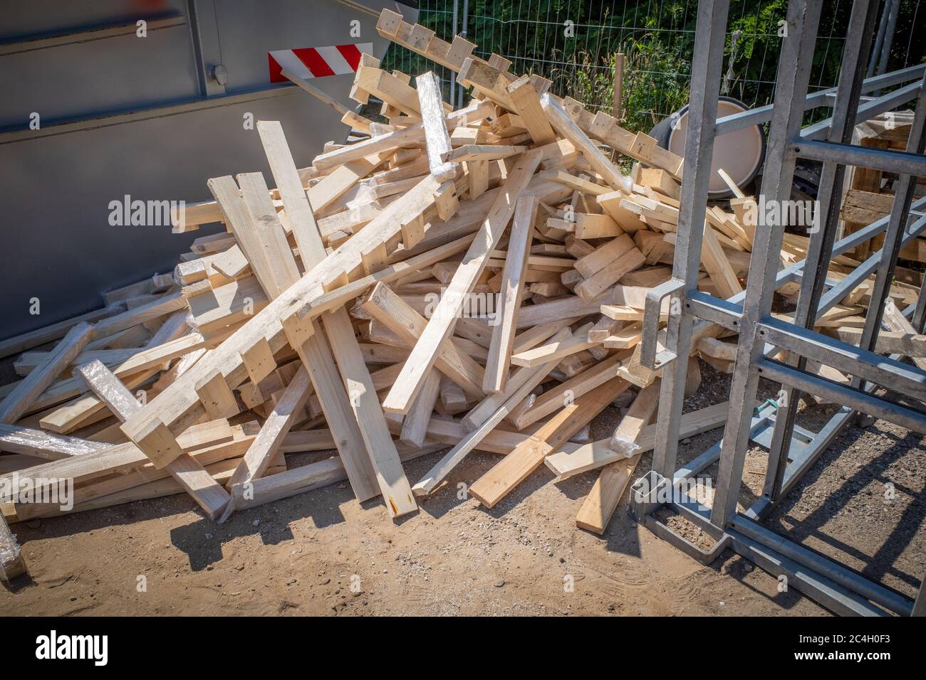 there's a pile of cut wood at a construction site Stock Photo - Alamy