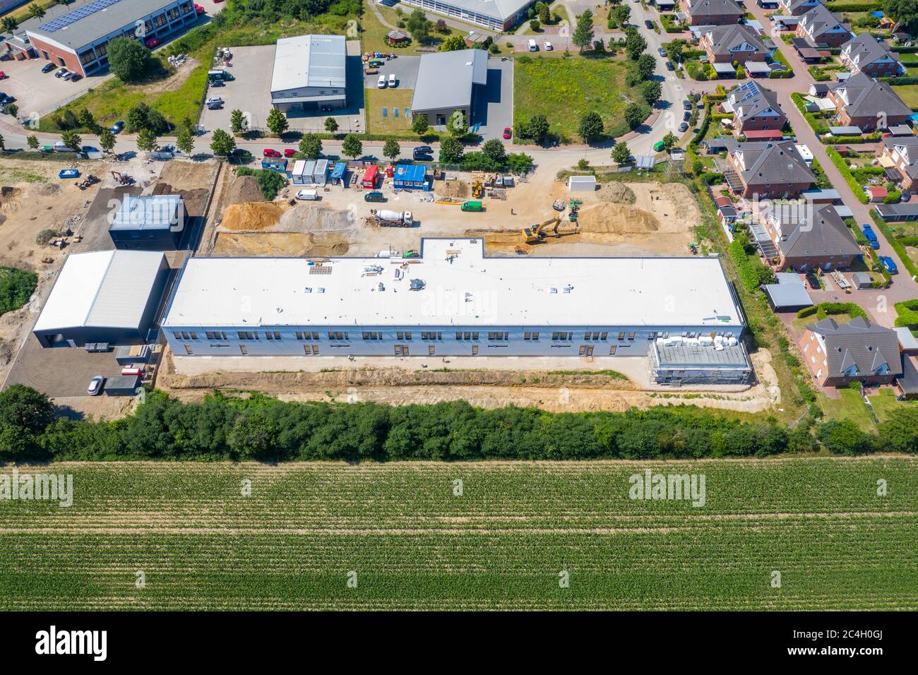 a drone photograph of a large construction site where a factory ...