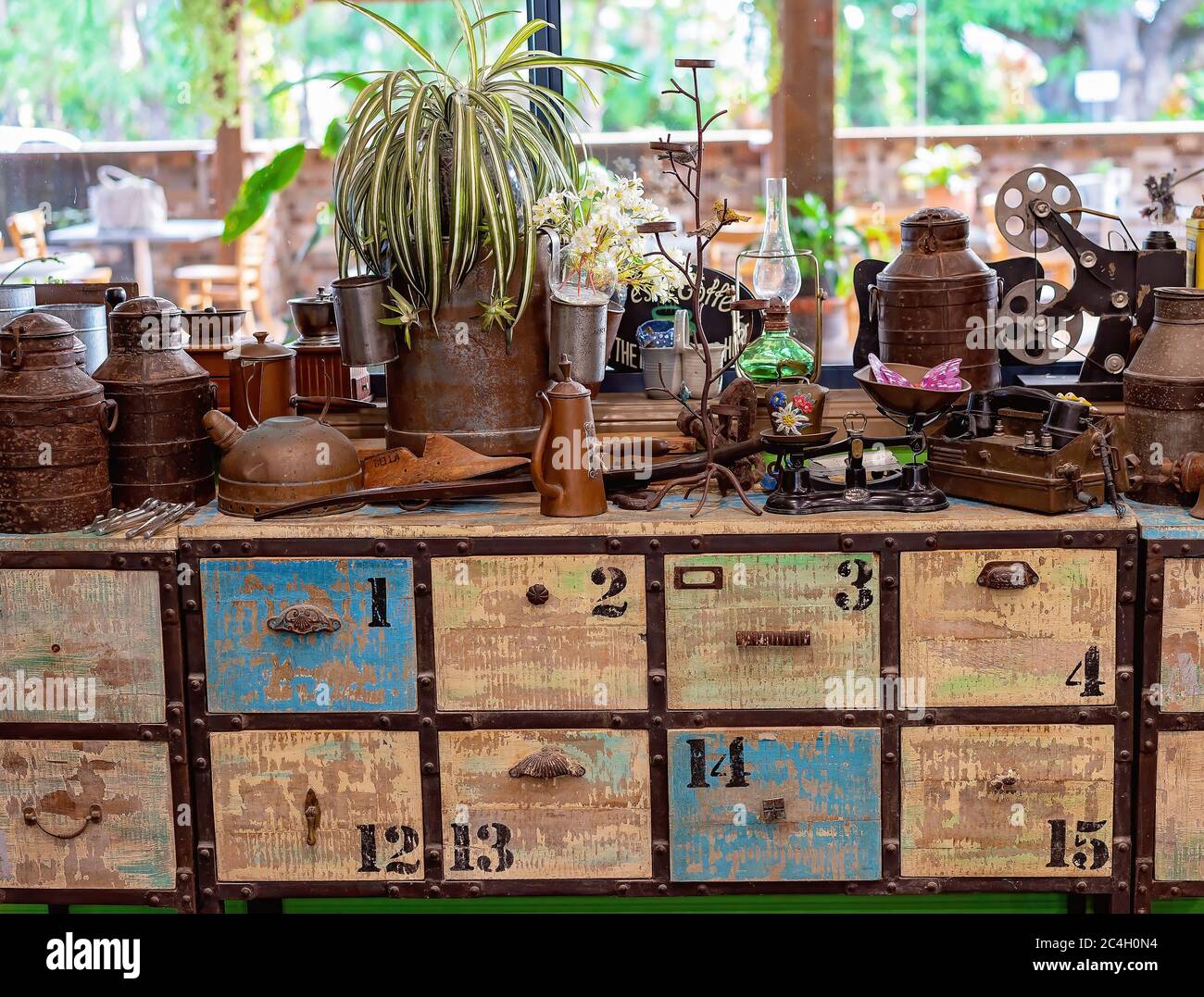 Collection of vintage household objects on display in a country coffee ...