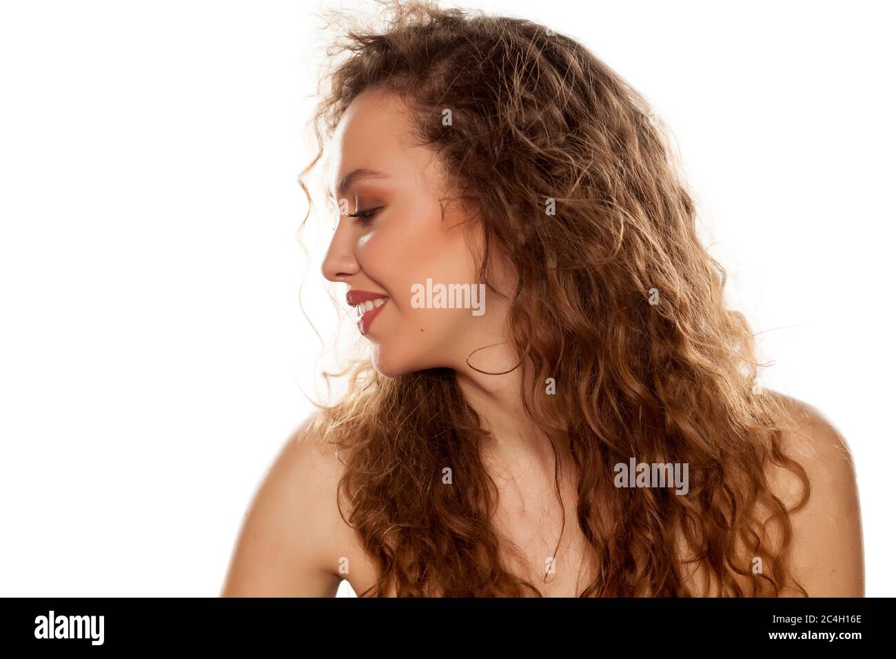 Profile of a young beautiful woman on a white background Stock Photo ...