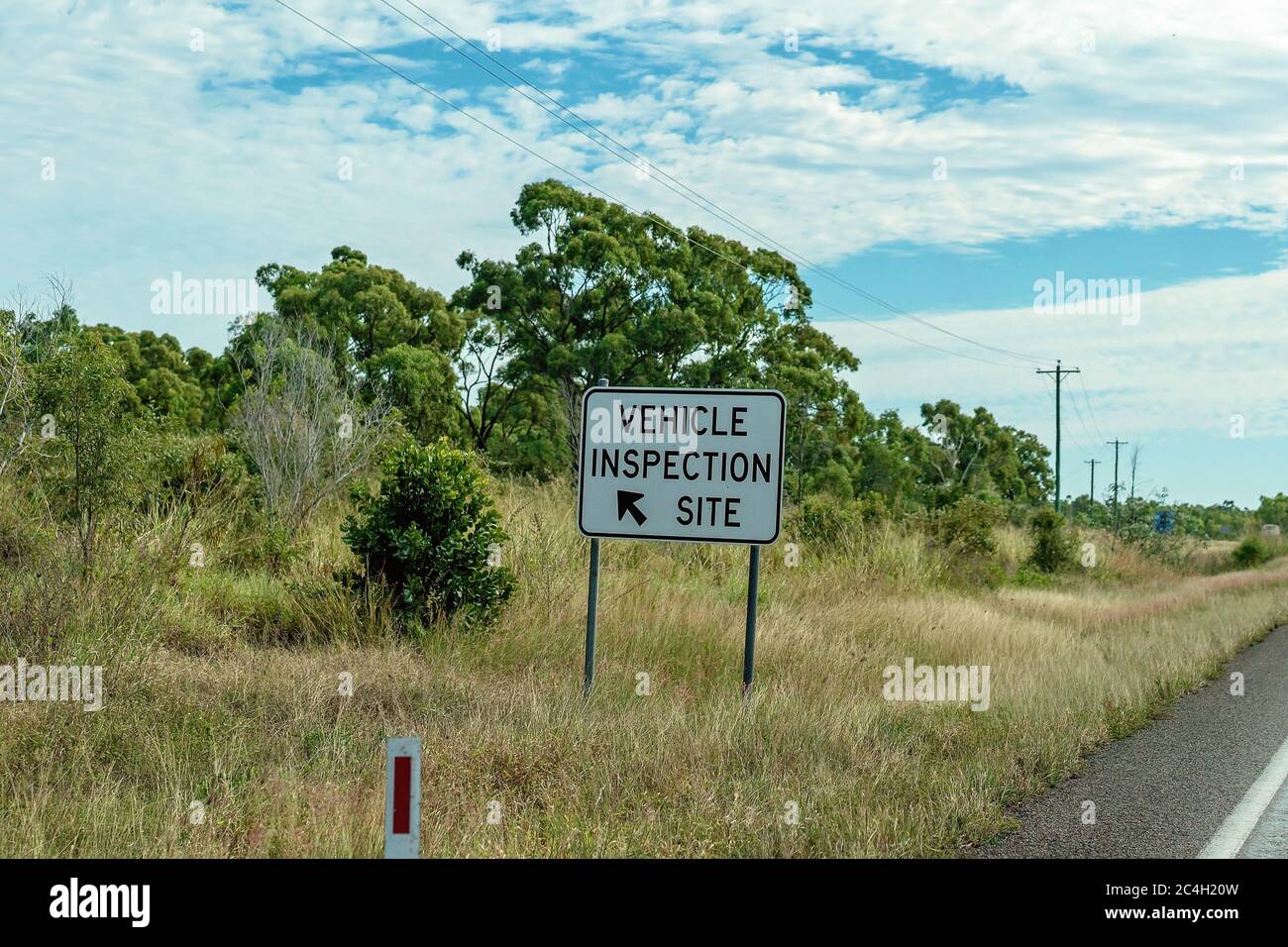 Vehicle Inspection Site highway sign with directional arrow Stock Photo ...
