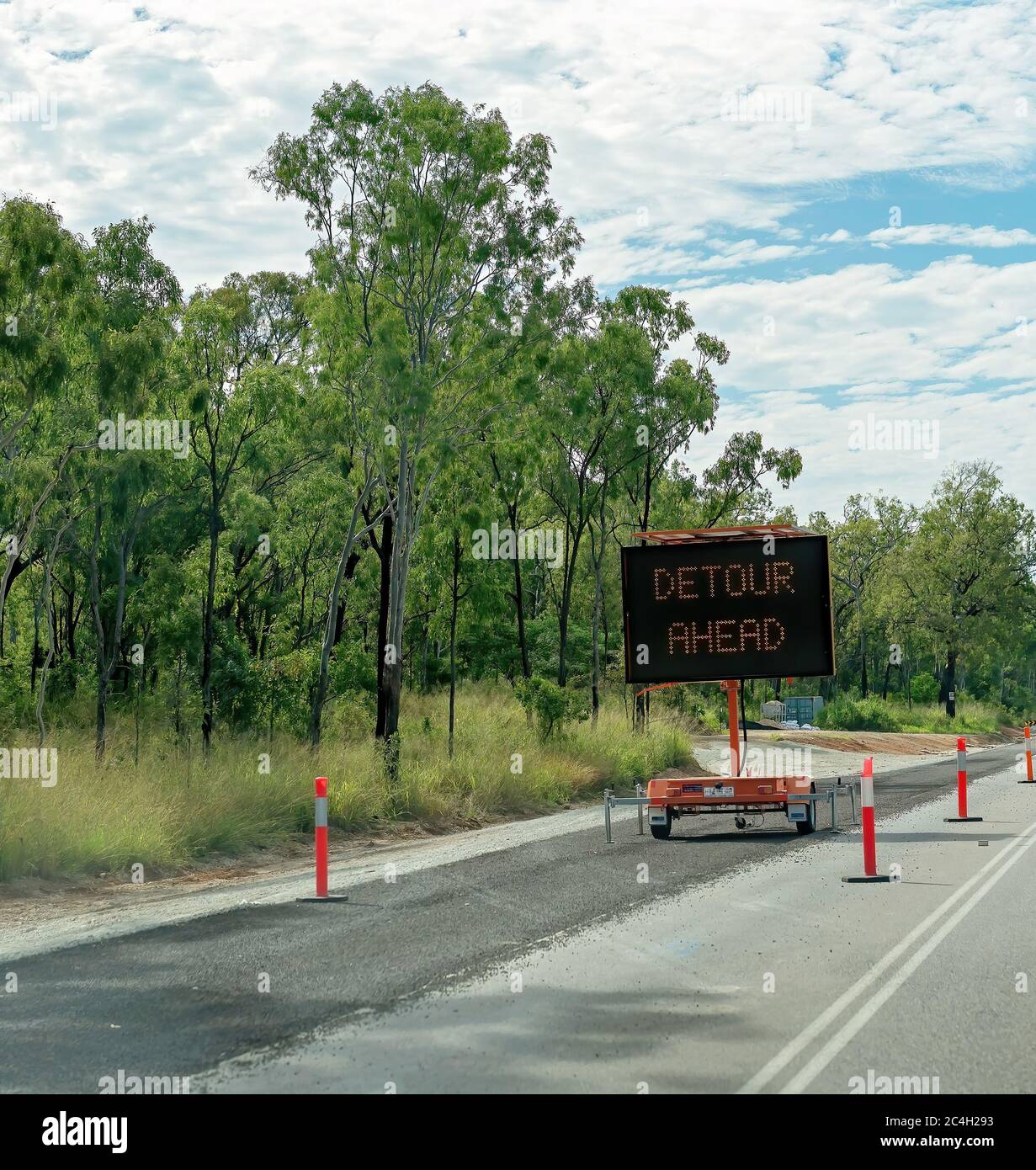 Detour ahead electronic signboard warning traffic of an alternate route ...