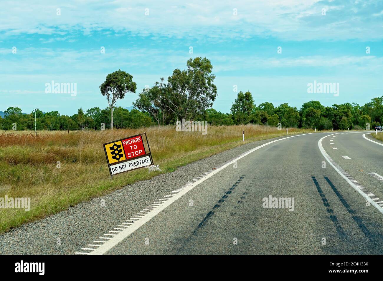 Reduce speed road sign rural hi-res stock photography and images - Alamy