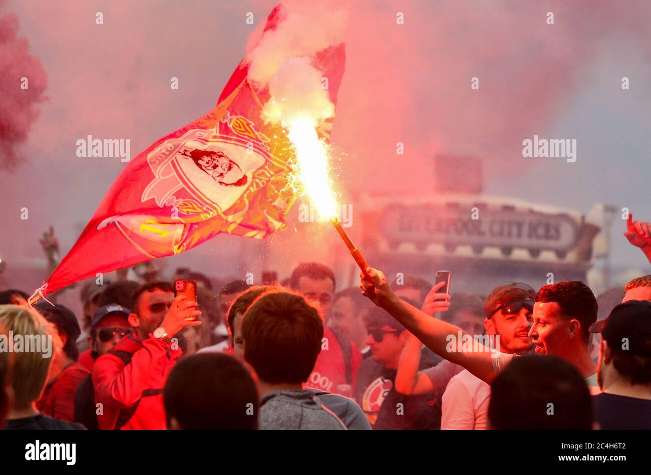 Liverpool fans let off flares outside the Liver Building in Liverpool ...