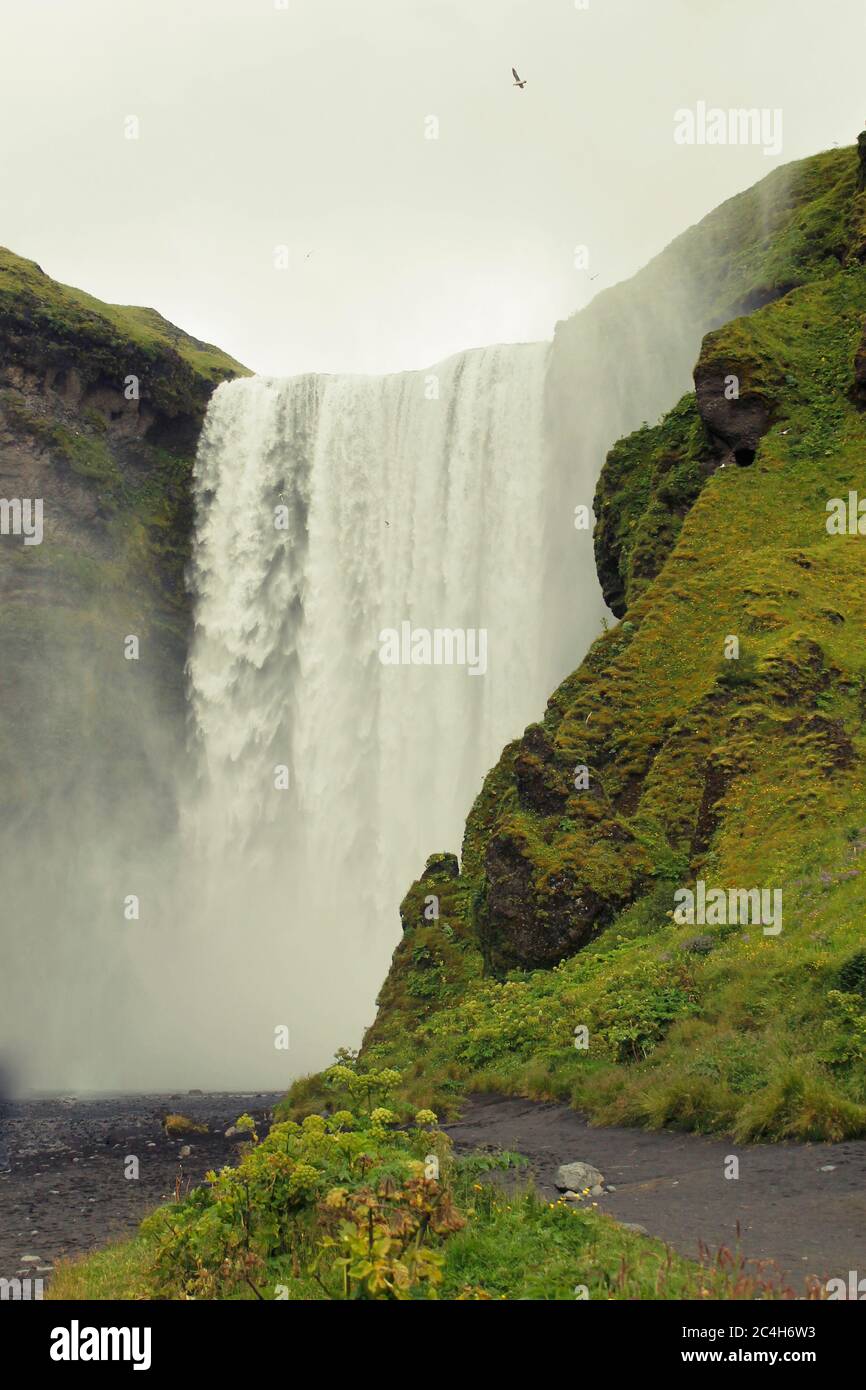 Skogafoss waterfall, a popular sightseeing destination in Iceland on ...