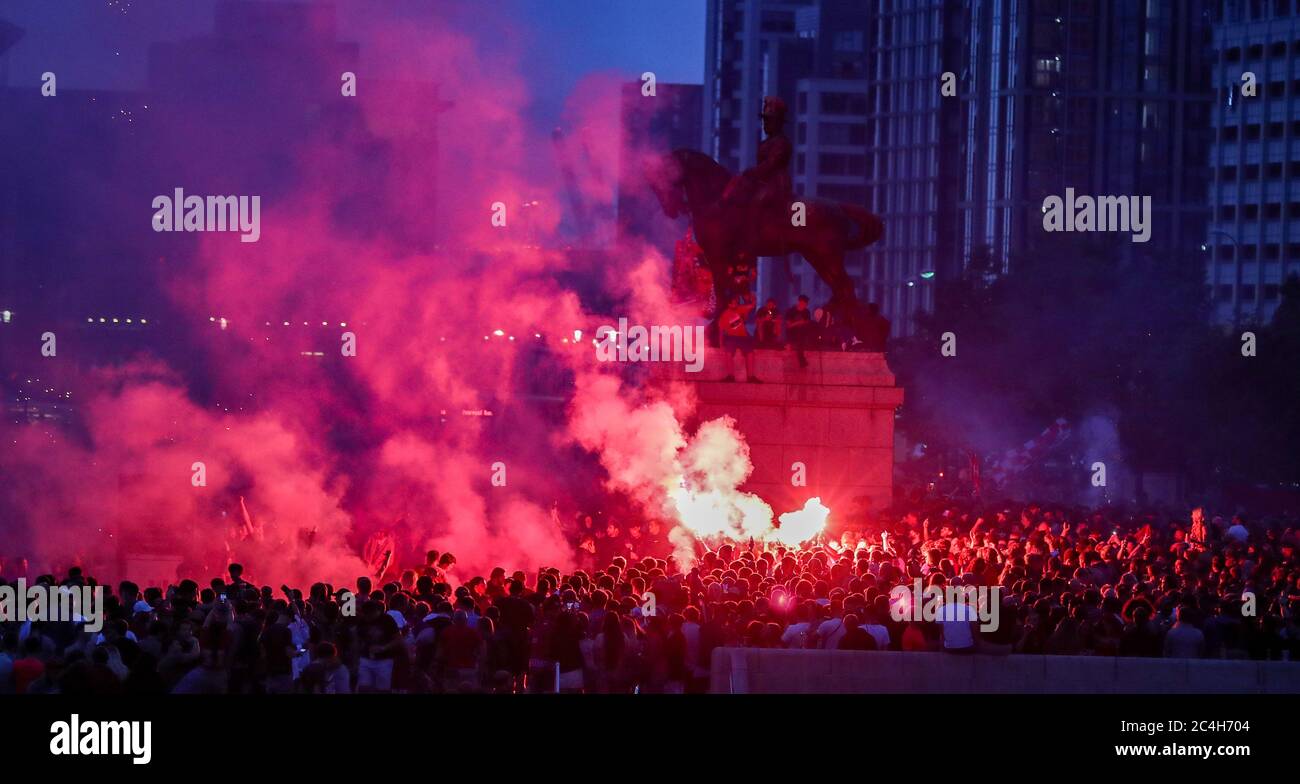 Liverpool fans let off flares outside the Liver Building in Liverpool ...