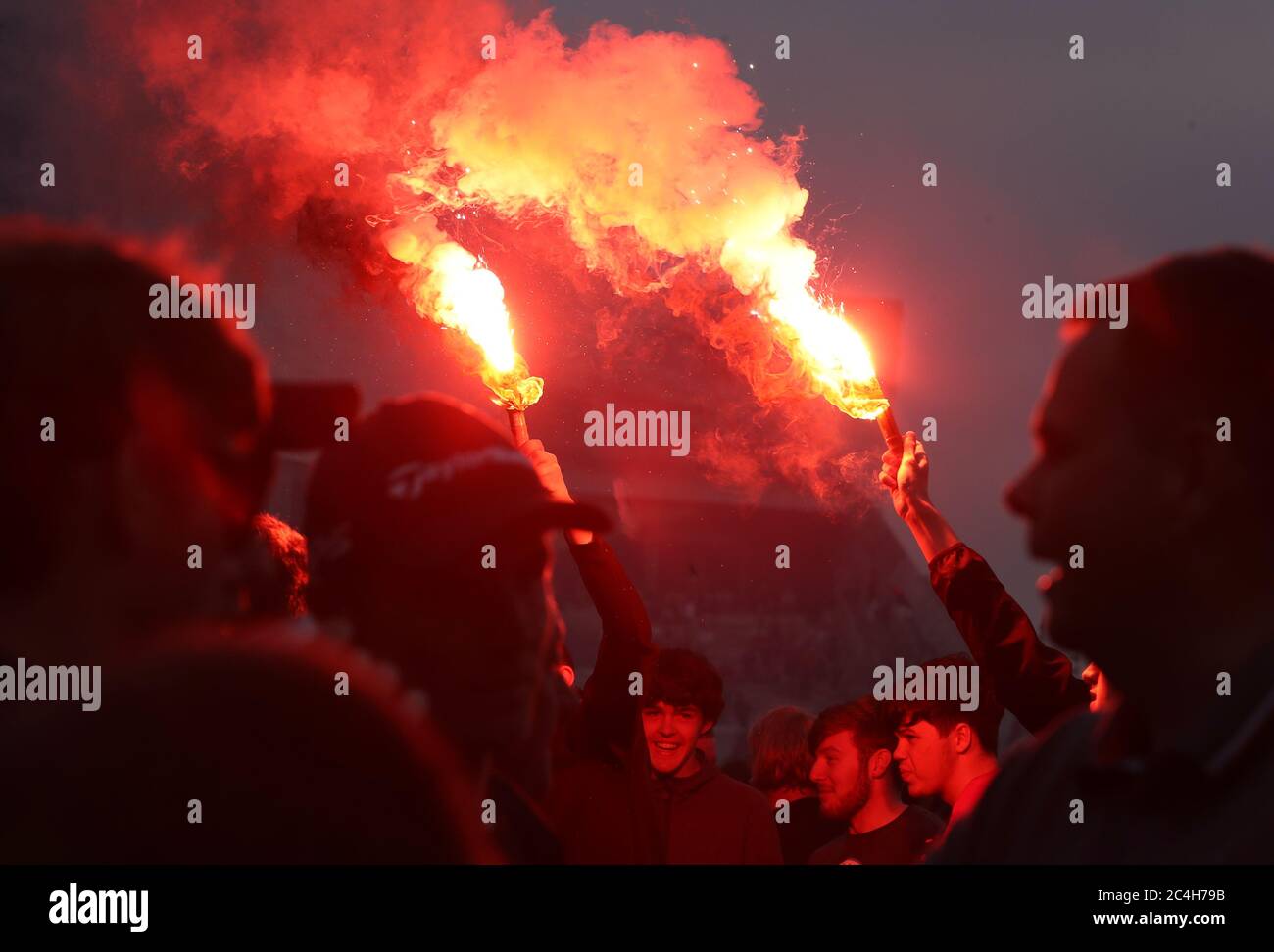 Liverpool fans let off flares outside the Liver Building in Liverpool ...